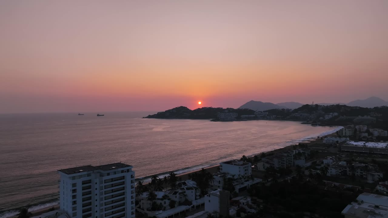 Scenic sunset on manzanillo bay in colima, mexico at santiago peninsula ...
