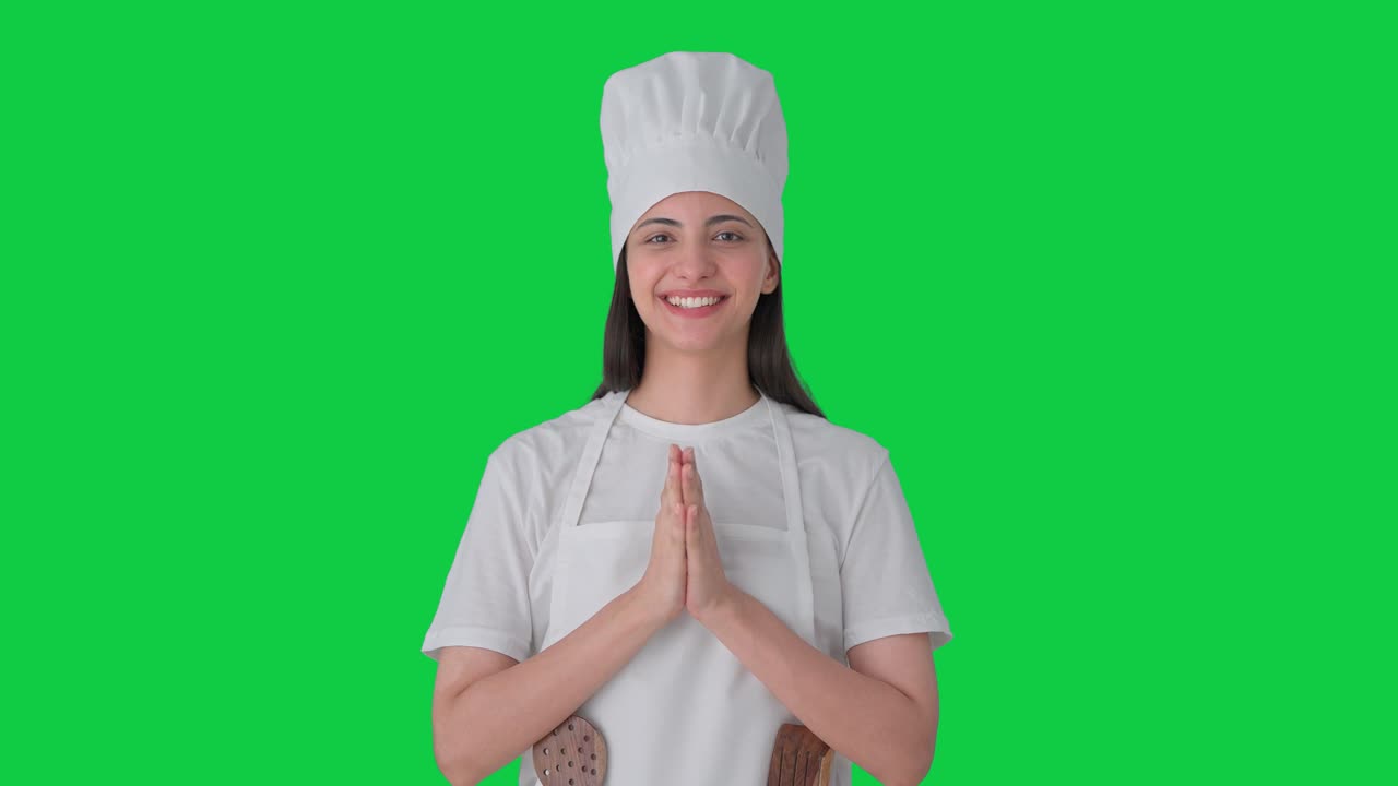 Premium stock video - Happy indian female professional chef doing ...