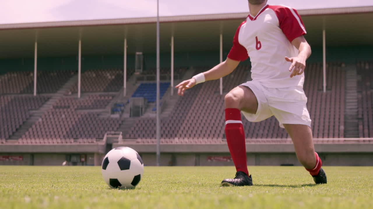 Premium stock video - Football player celebrating his success