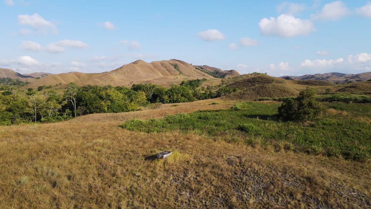 Indonesian nature landscape with sloping mountains during sunny day in ...