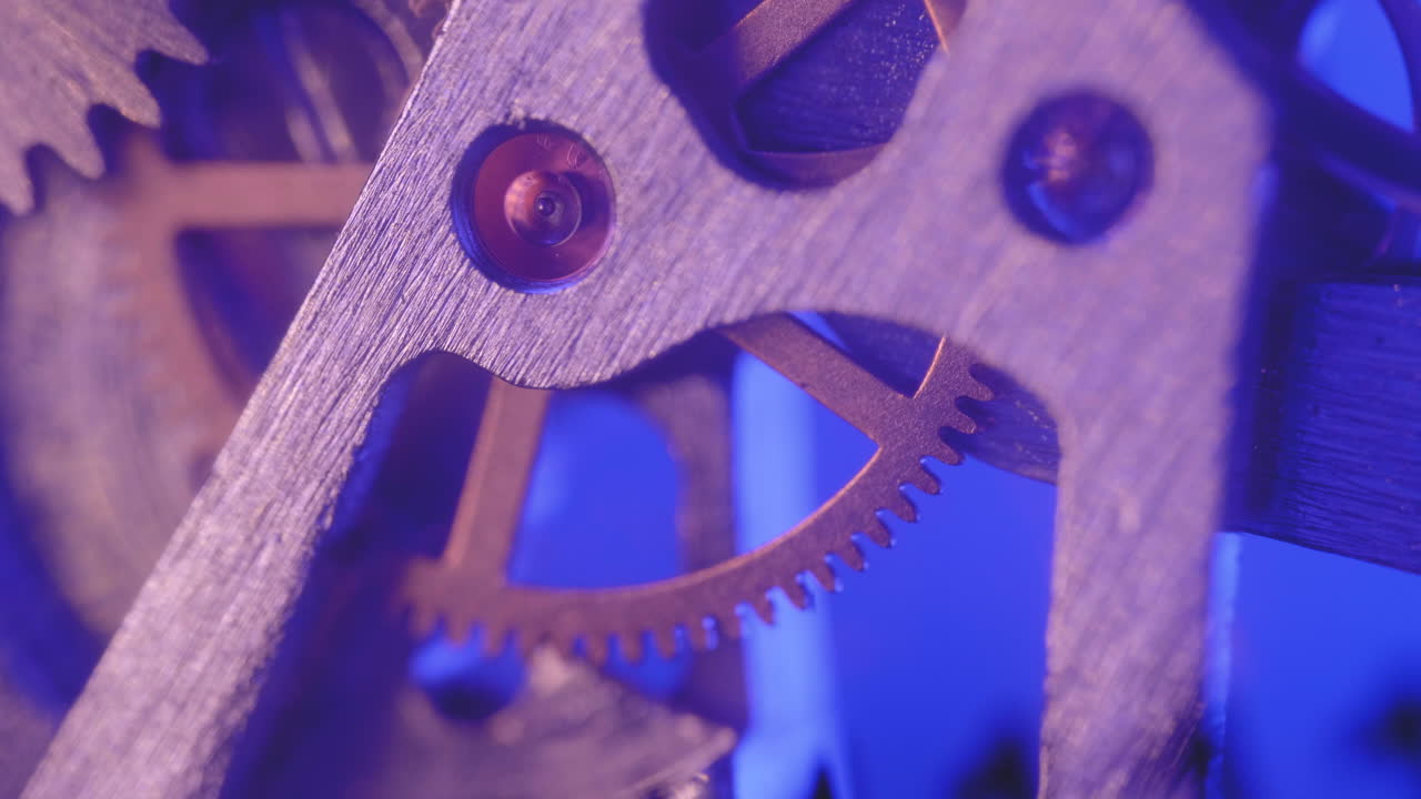 Cogwheel And Gears Working In Mechanism Of Watch In Blue Background ...