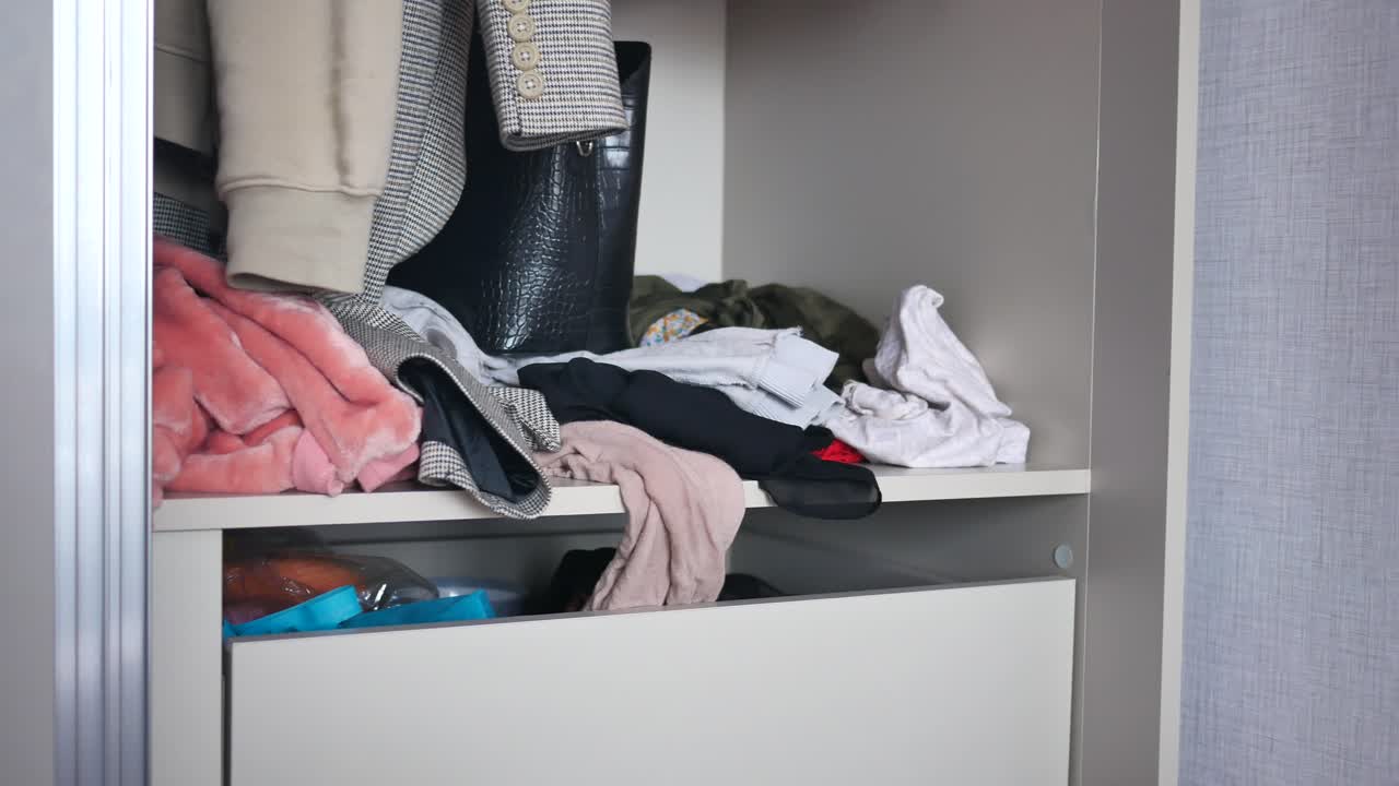 Disorganized closet and drawers Premium Stock Video Footage