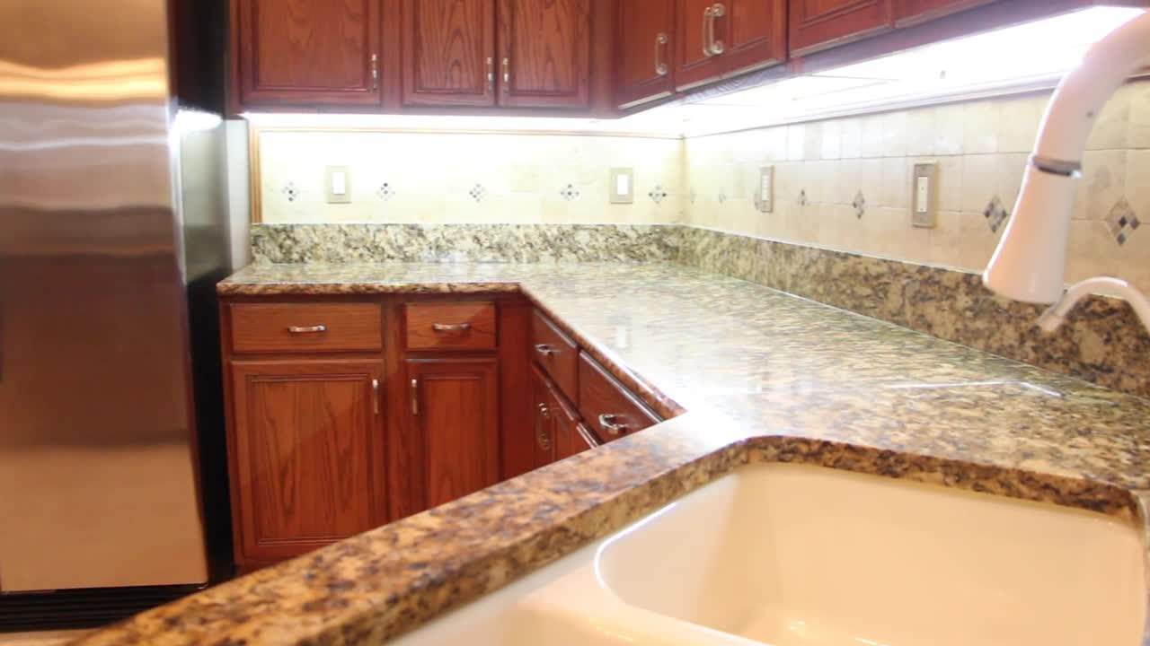 Premium stock video - Kitchen with granite countertops remodel