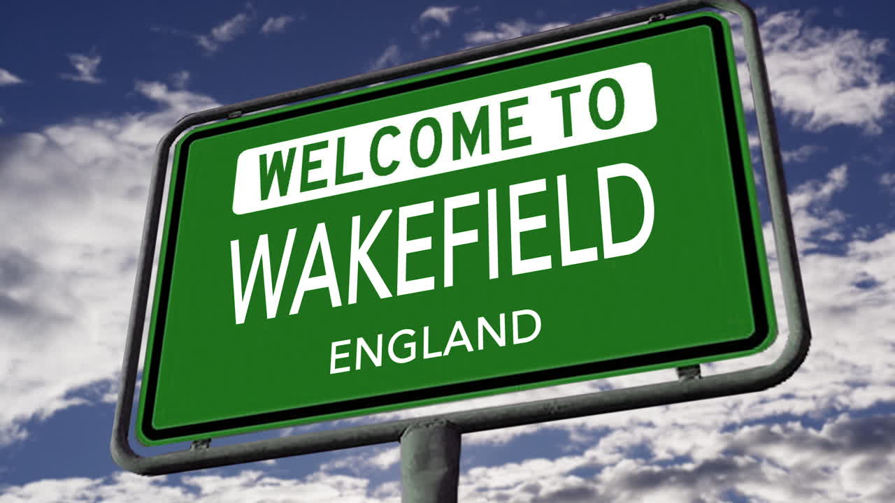 Premium stock video - Welcome to wakefield, england, uk city road sign ...