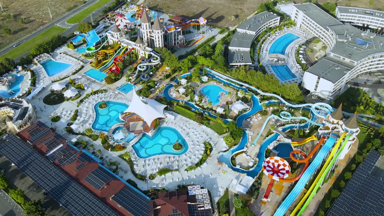 Premium stock video - Aerial view of aqua paradise water park is an aquapark in the historic ...