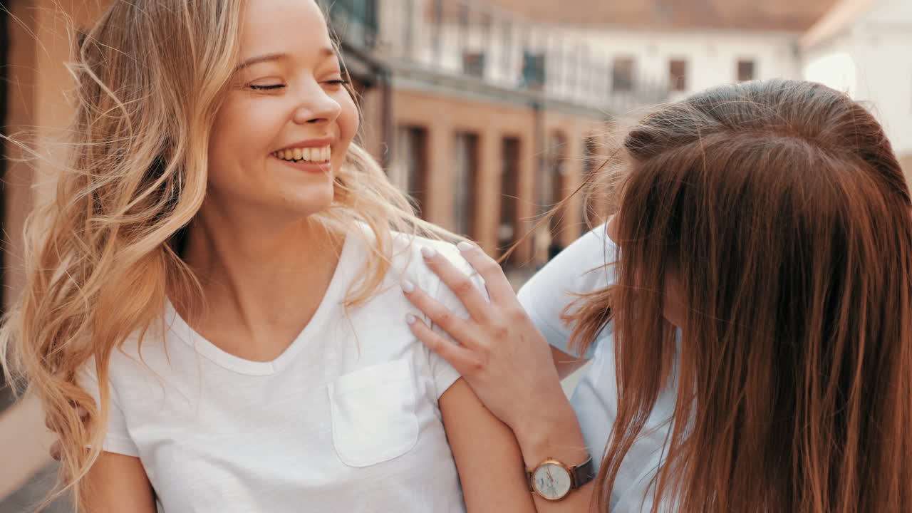 two happy young women friends outdoors | freepik