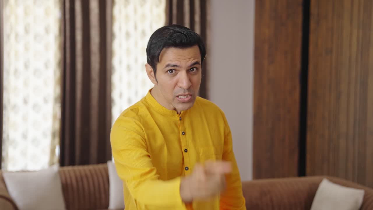 Premium stock video - Angry indian man screaming and shouting