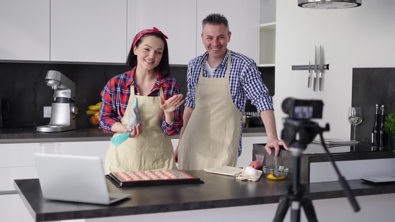 Free stock video - Video stream of positive couple at kitchen, making ...