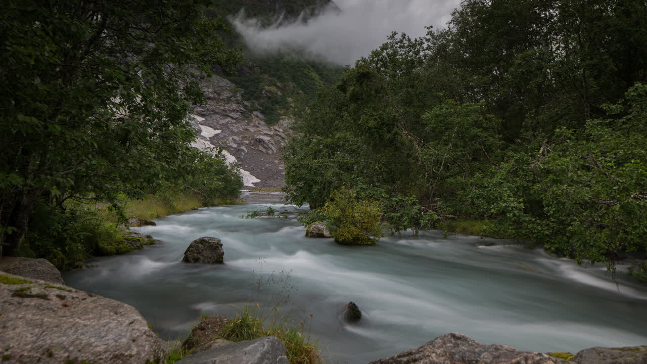 Premium stock video - Norway misty rapids 4k 00