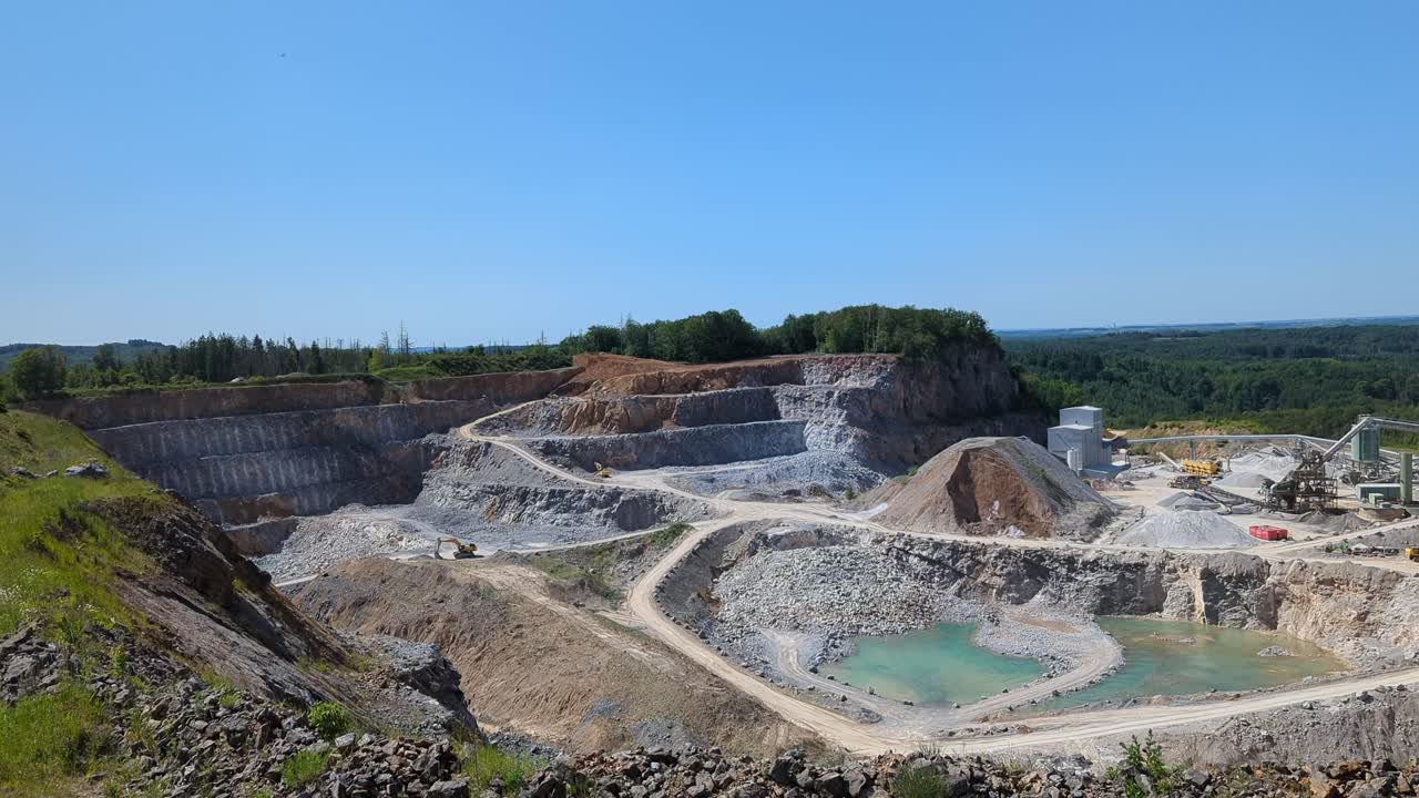 A quarry, in the photo a quarry and a blue sky in the background in ...