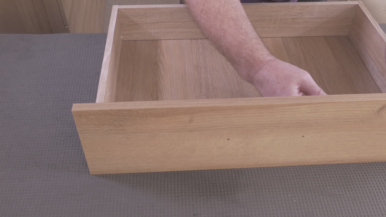 Premium stock video - Flat pack furniture assembly