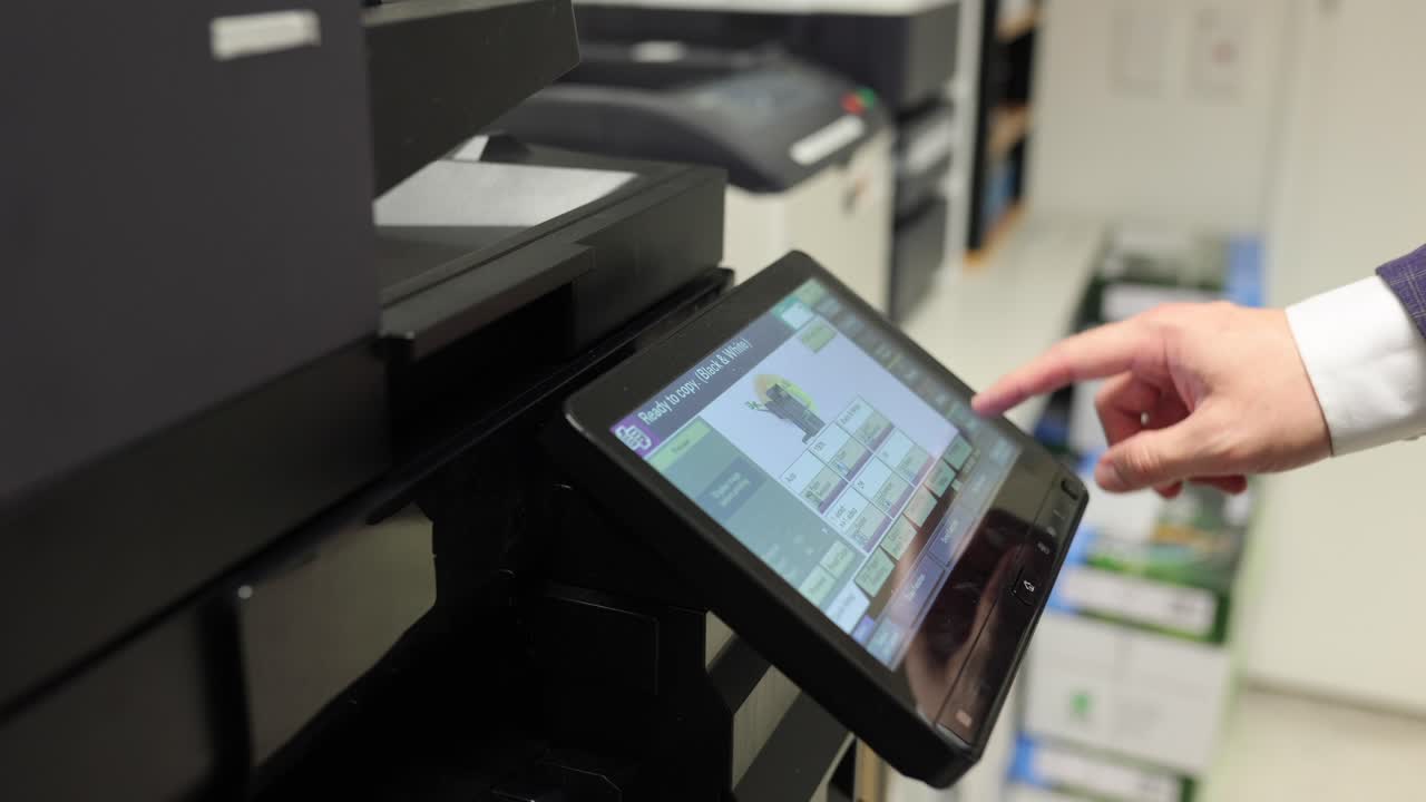 Premium stock video - Business Man In Office Using a Photo Copier ...