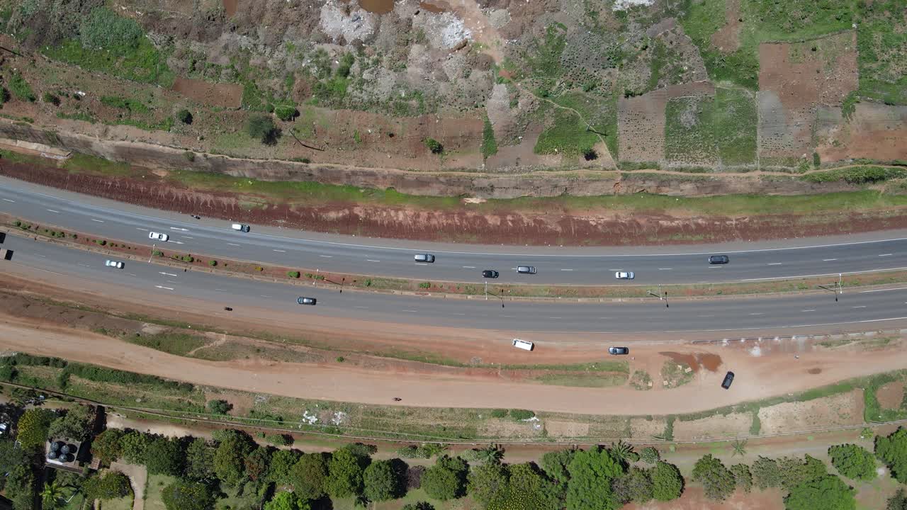 Cars Moving In The Poorly Constructed Road Along Kibera Road Nairobi ...