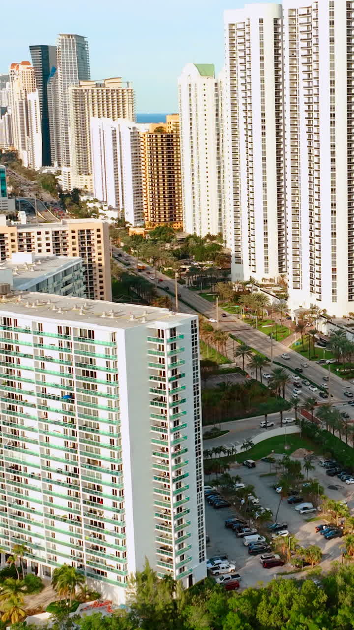 Tops of high-rise buildings on beach Sunny Isles Beach Florida. Collins ...