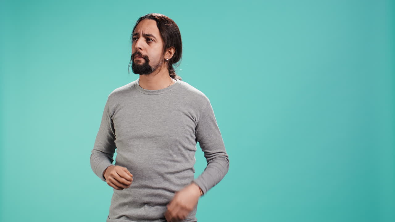 Premium stock video - Portrait of man feeling perplexed by confusing ...