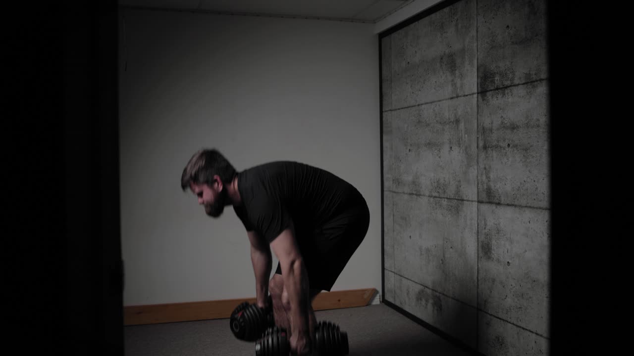 Premium stock video - Dumbbell romanian deadlift, cinematic lighting ...