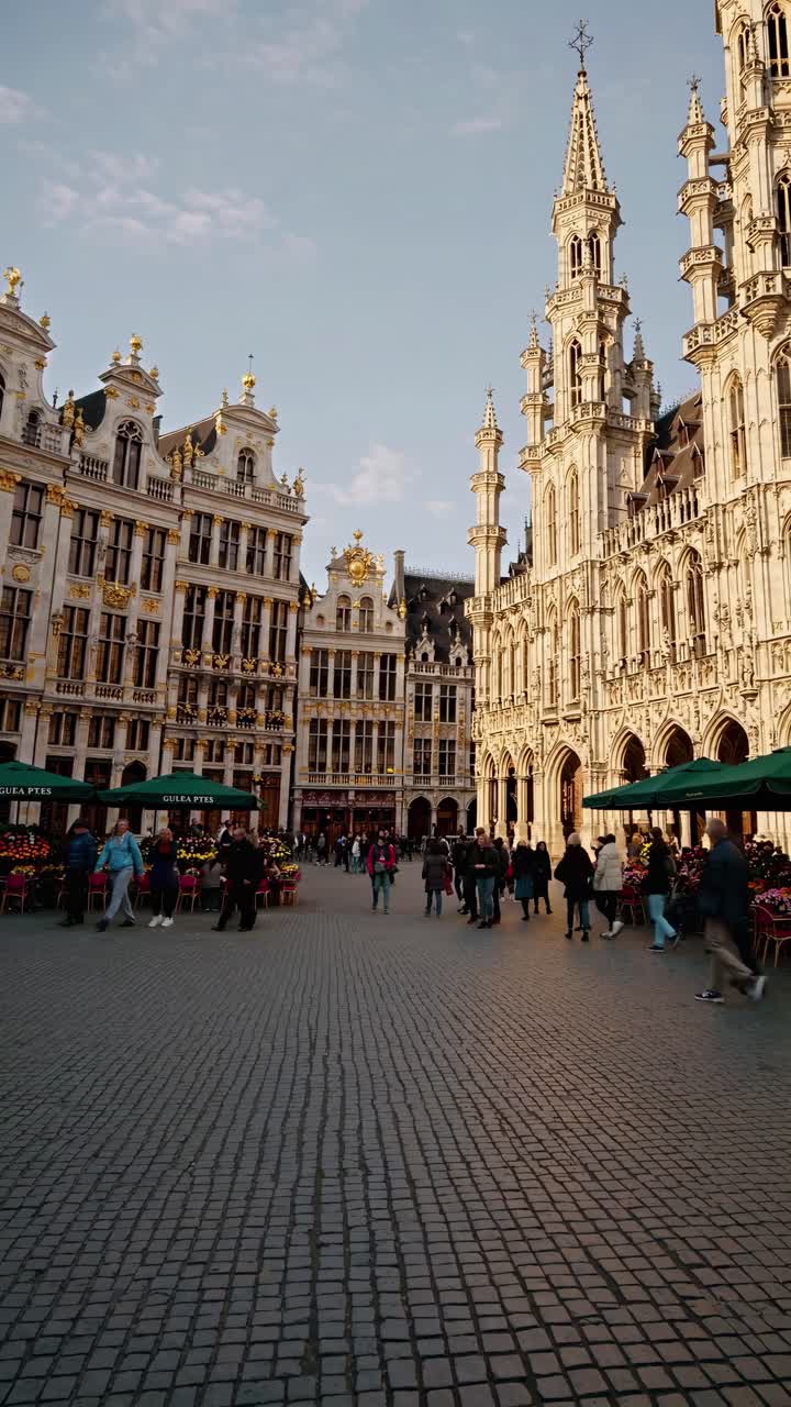 Wide-angle video shot of a historic European square, showcasing ornate ...