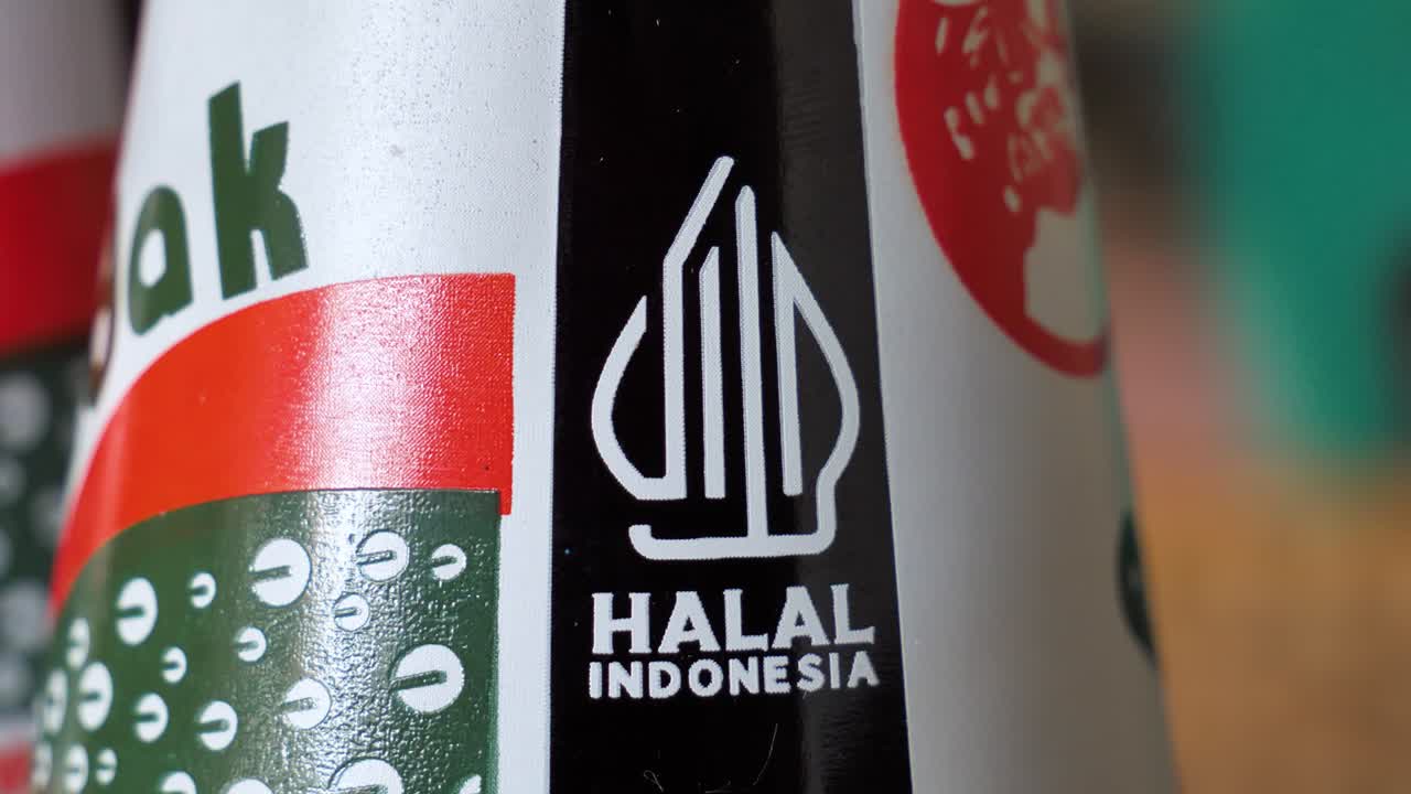 Close-up shot of Halal symbol on famous Indonesia drink Cap Badak ...