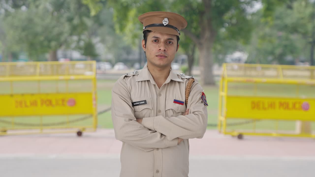 Premium stock video - Portrait of confident indian police officer