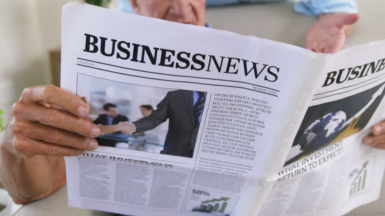 Old couple talking while the man is reading | Premium Stock Video Footage