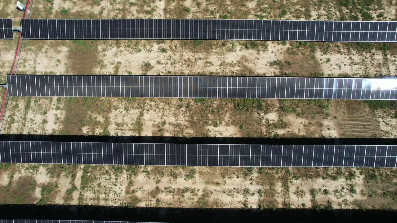 Premium stock video - A wisconsin field of solar panels absorbs the sun ...