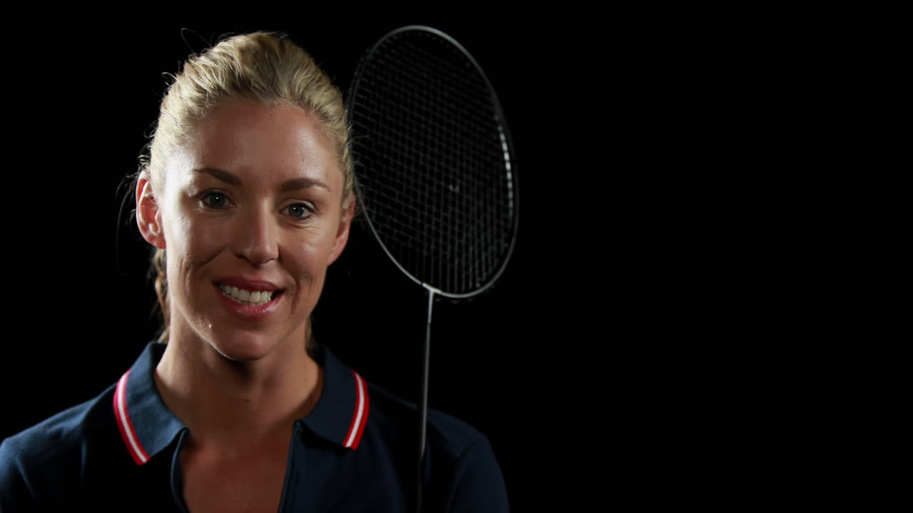 Badminton player standing with arms crossed Premium Stock Video Footage