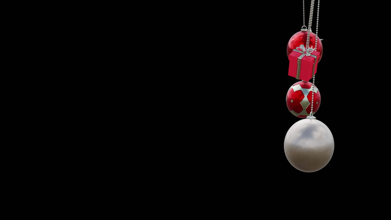 Animation of christmas baubles decorations on black background ...