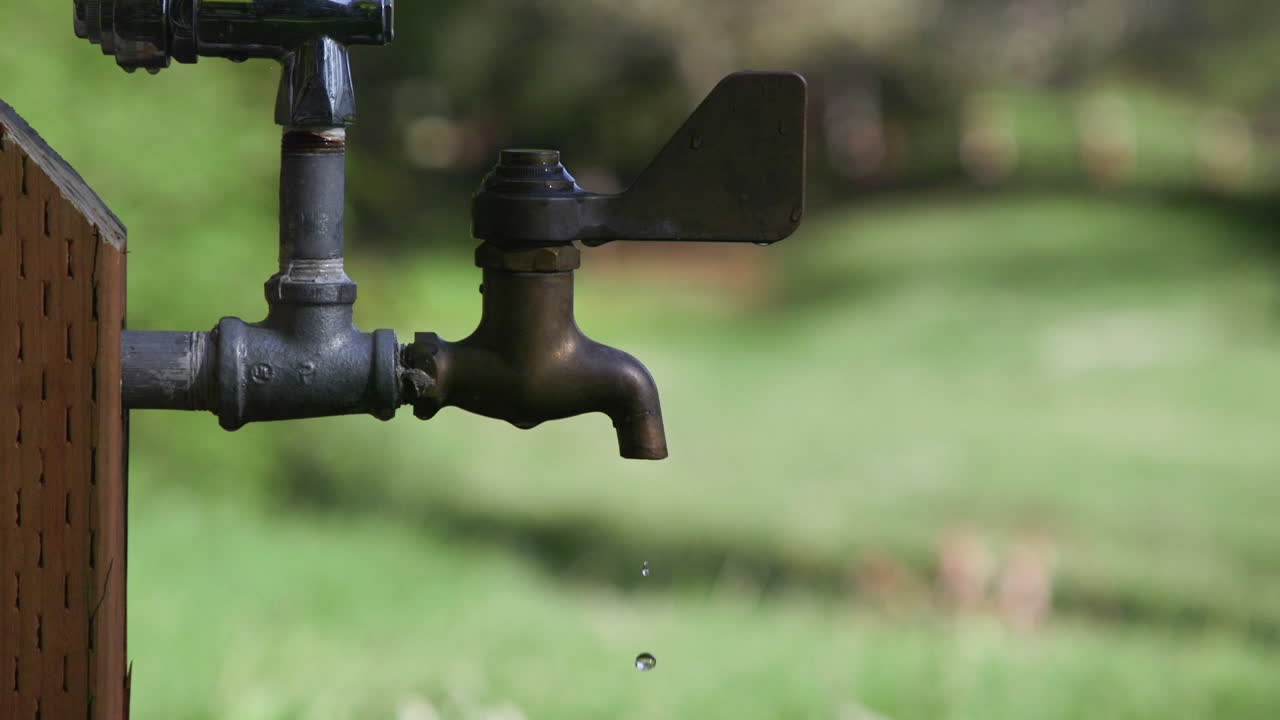 Premium stock video - Outdoor water spigot at park. close-up 1. 7sec-60fps