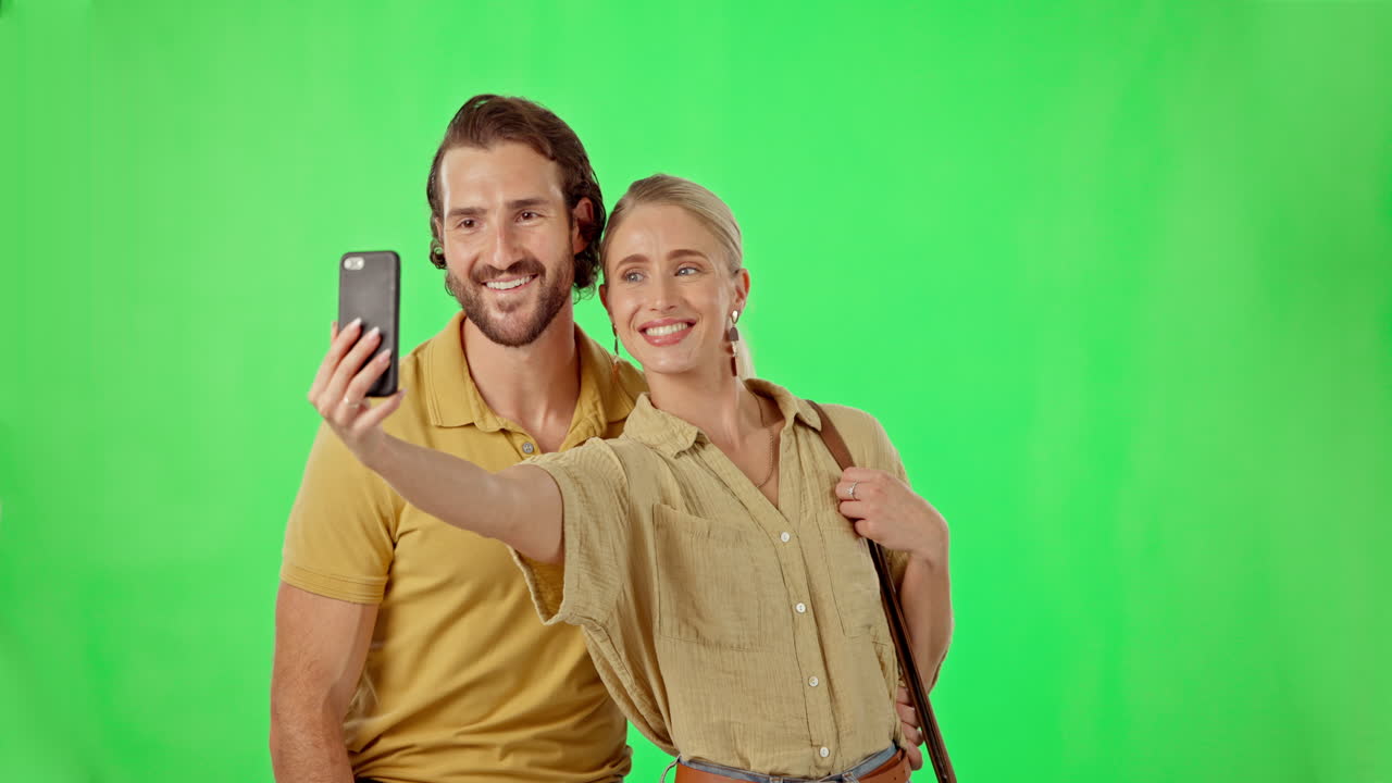 Premium stock video - Selfie, phone and couple in studio with green