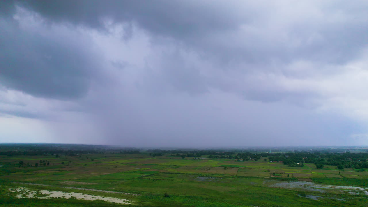 Drone shot of huge plain land in nepal full of green surroundings and ...