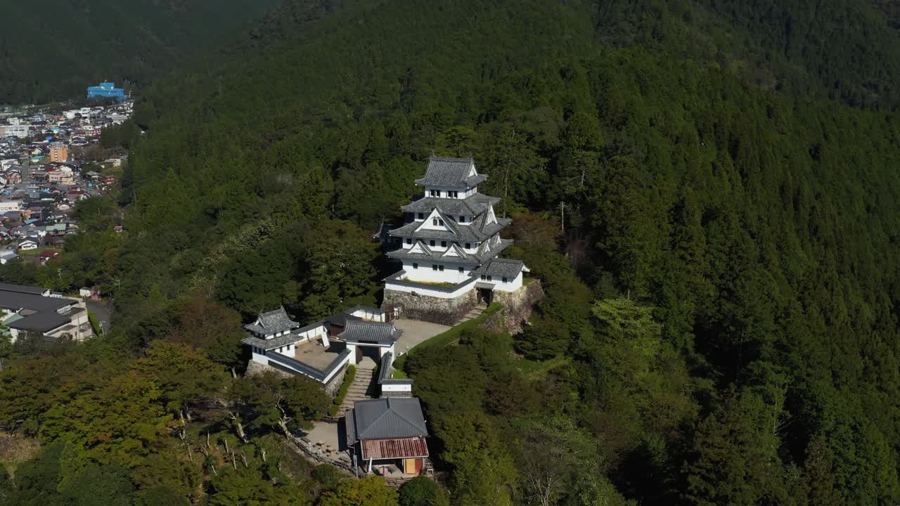 Premium stock video - Gujo hachiman castle, aerial pan shot, gifu japan
