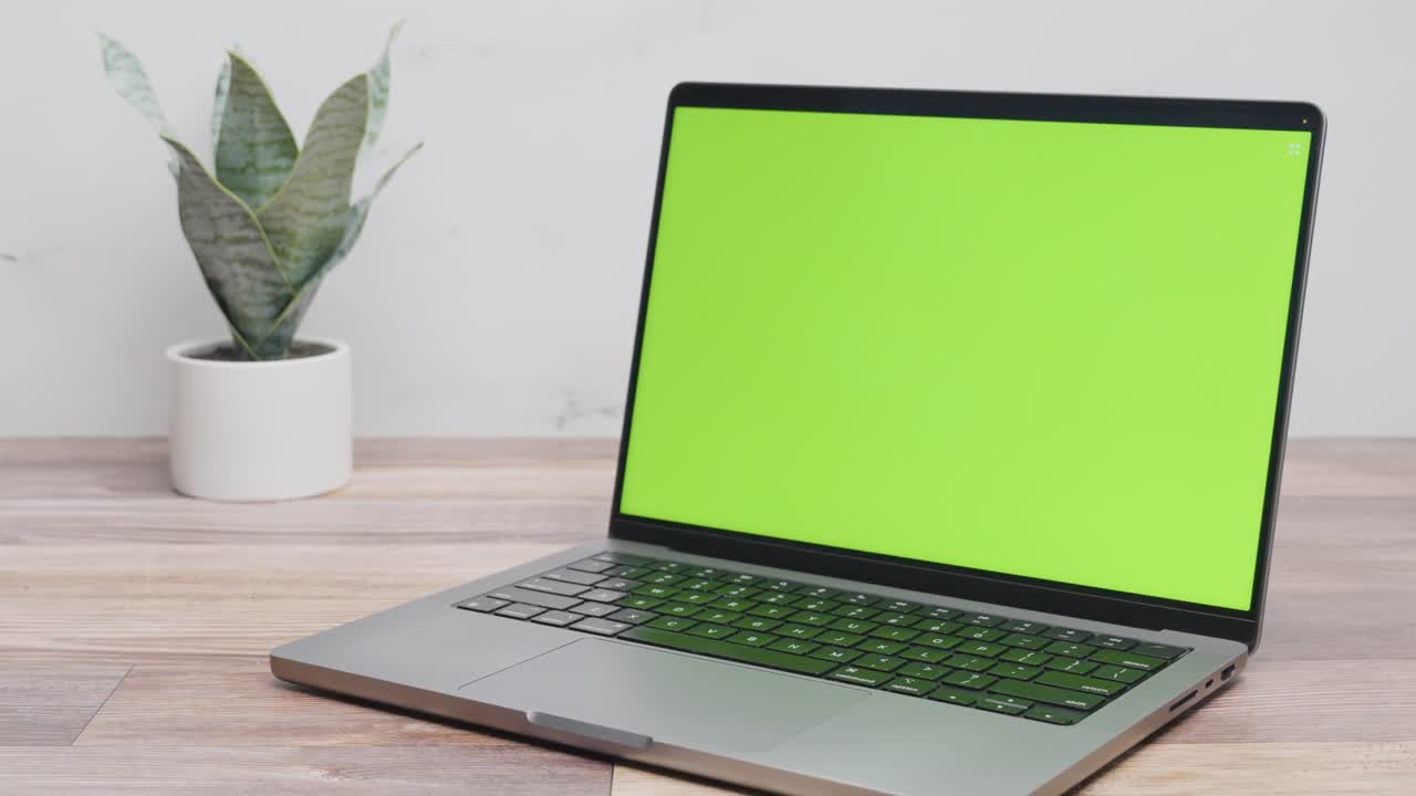 Premium stock video - Green screen laptop work from home setup with ...