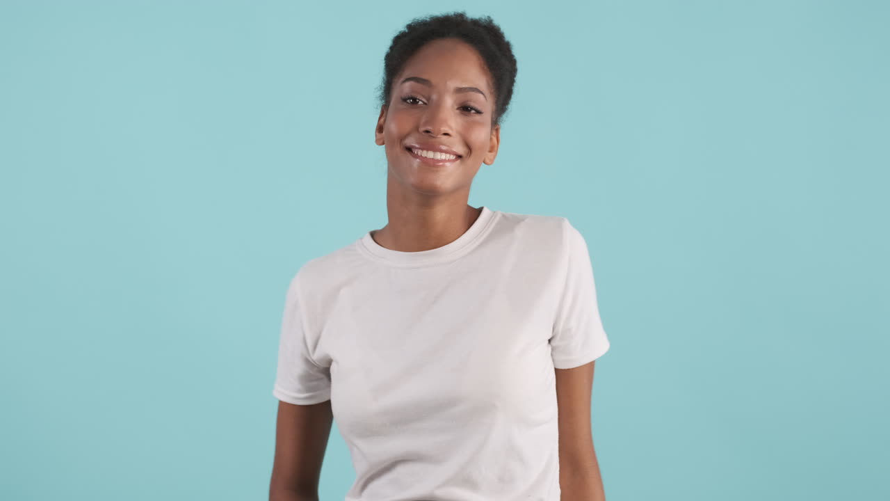 Free stock video - Smiling woman dancing