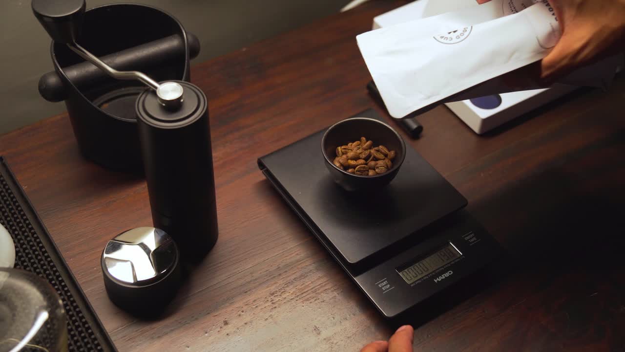 Premium stock video - Measure precise weight of coffee beans before ...