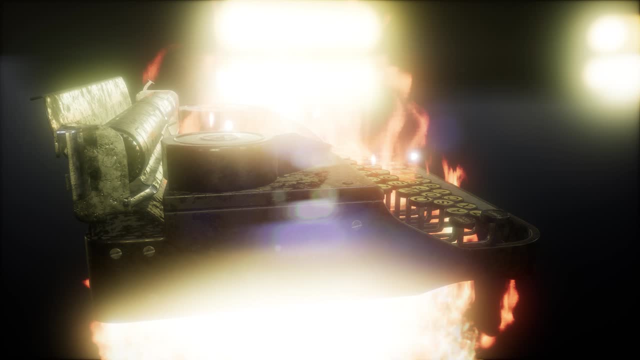 Premium stock video - Retro typewriter in the fire
