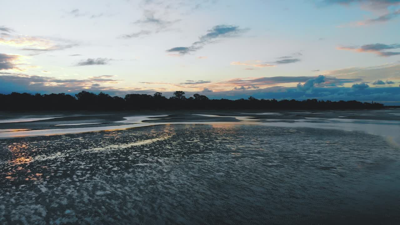Slow Push Towards The Treeline Over An Amazingly Reflective Beach From ...